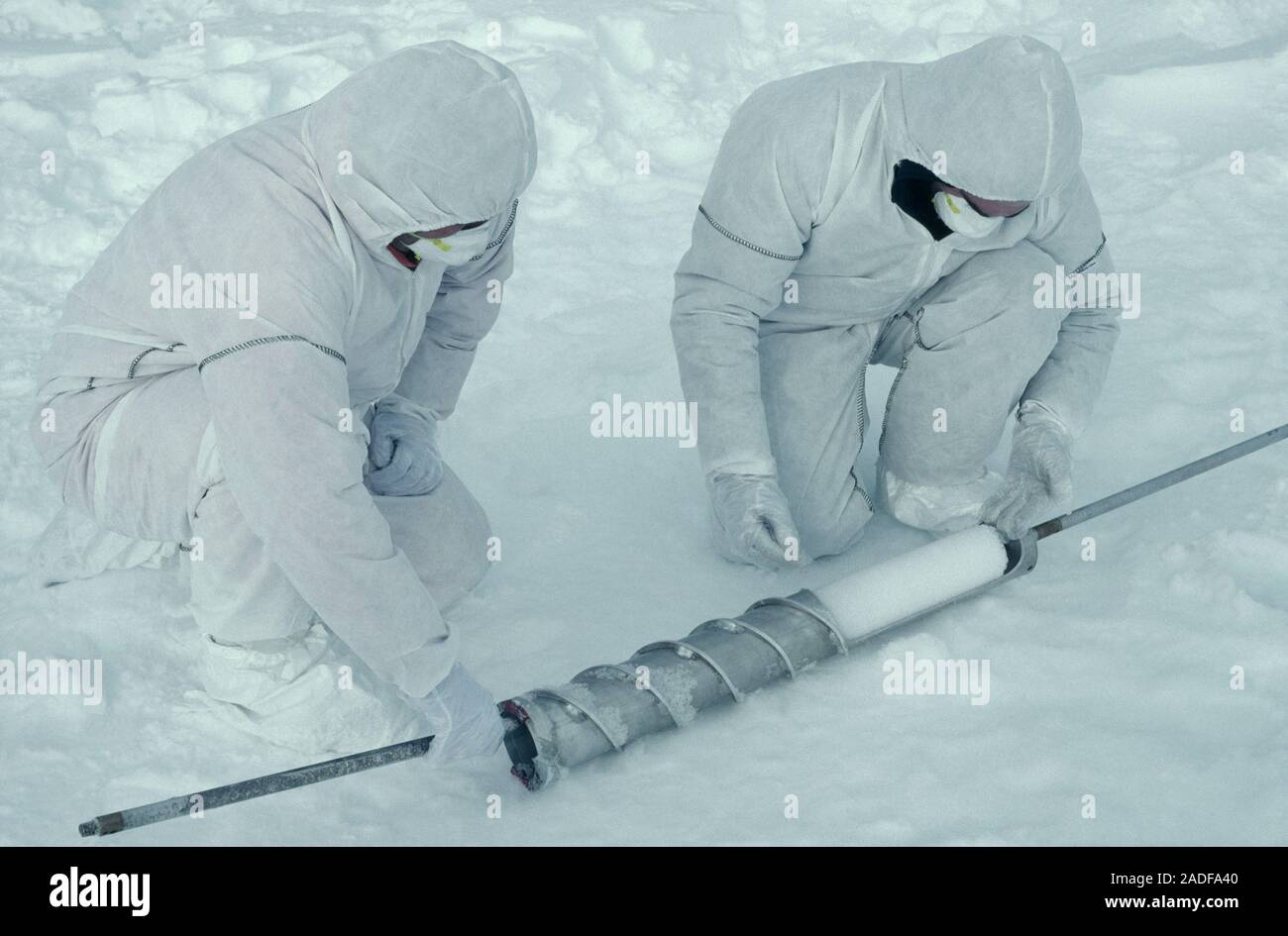 Climate Change research. Scientists collecting a 10 metre ice core ...