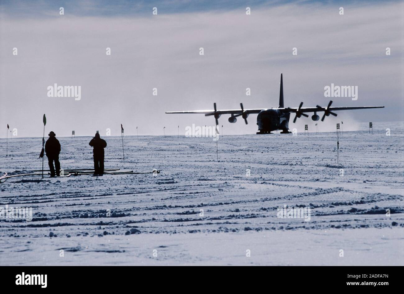 MODEL RELEASED. Antarctic airfield. Ski-equipped Hercules LC130 ...
