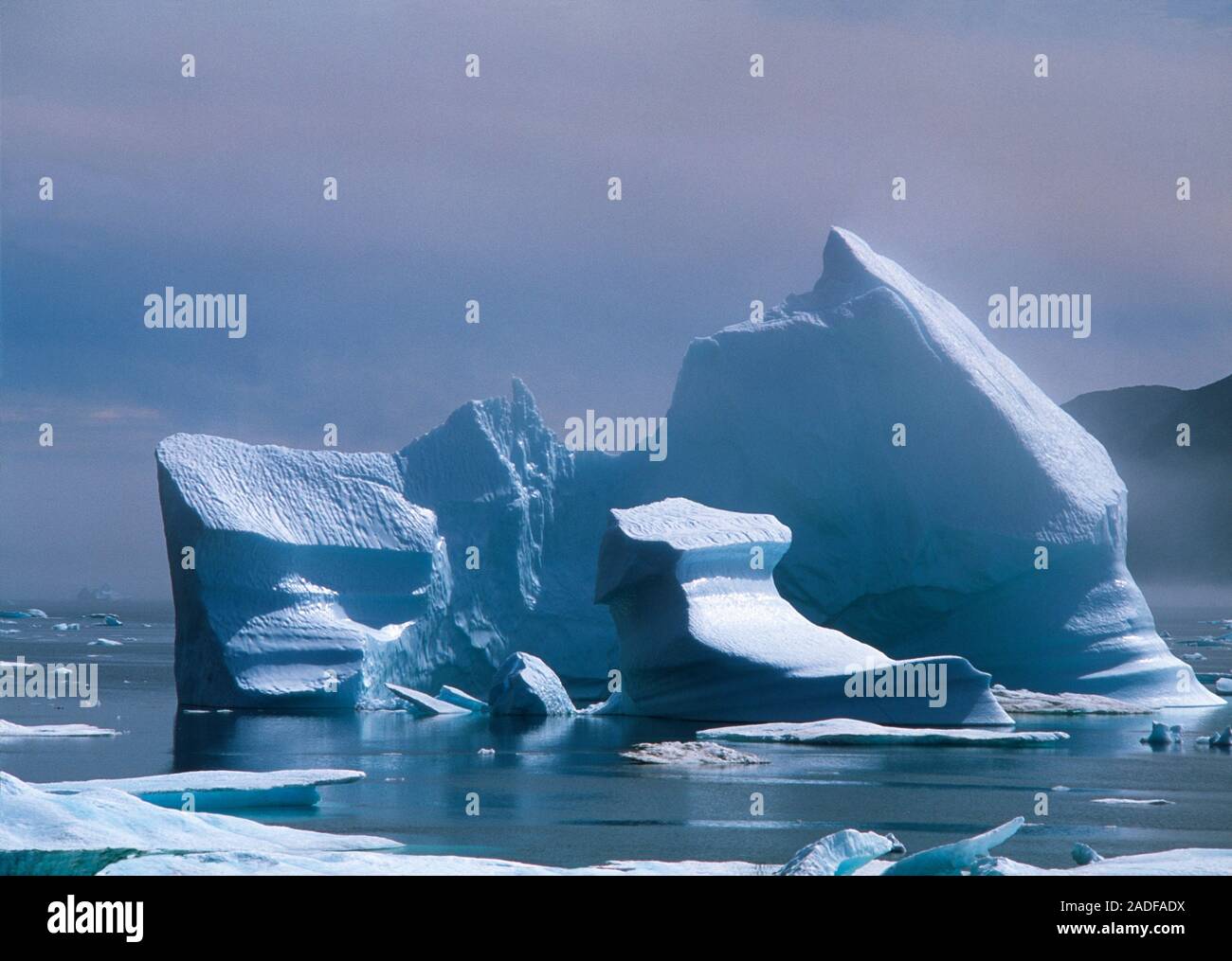 Iceberg. This huge chunk of floating ice has broken away from an ice ...
