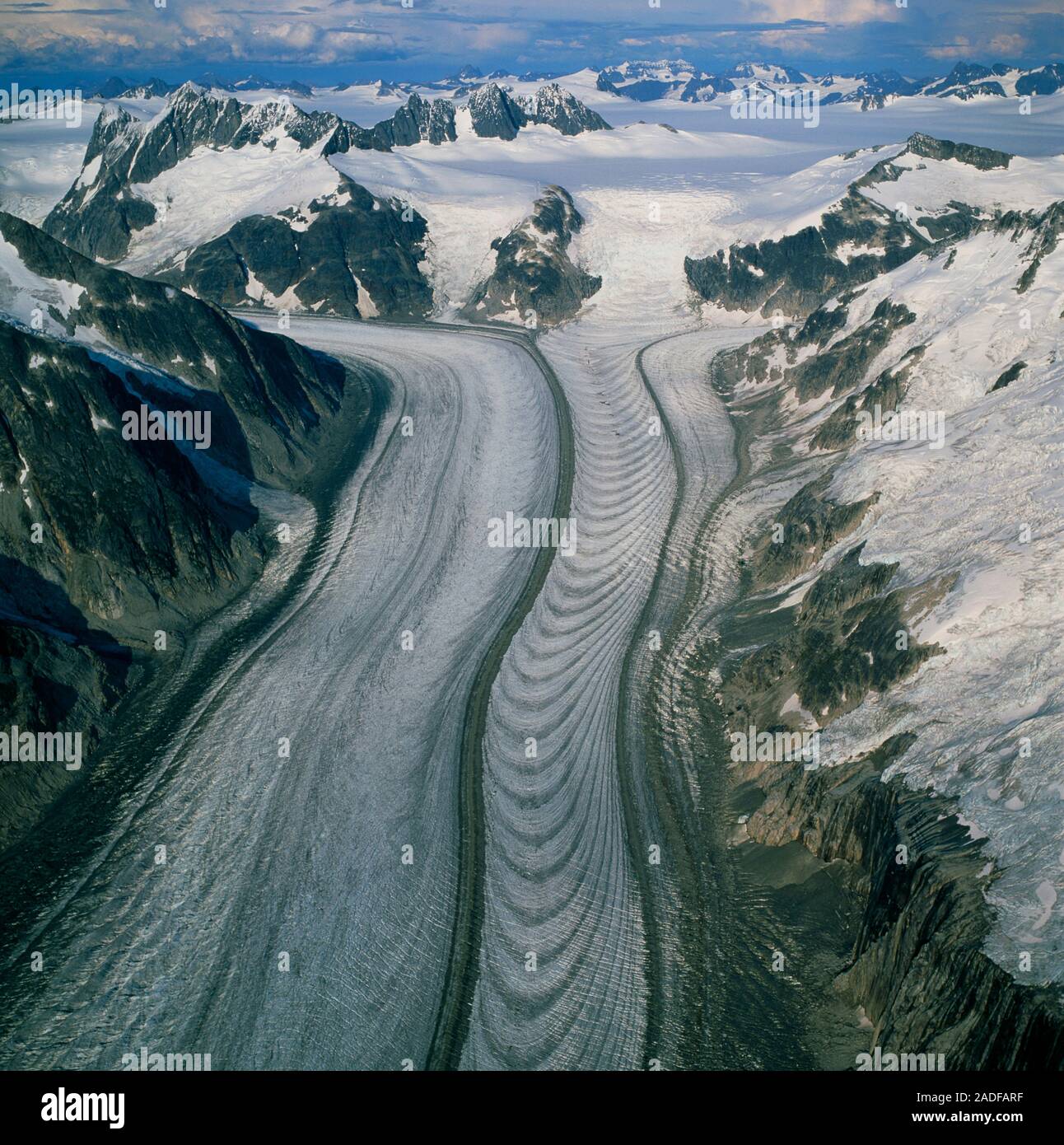 Glacier. Aerial view of a glacier showing its annual growth curves, or ...
