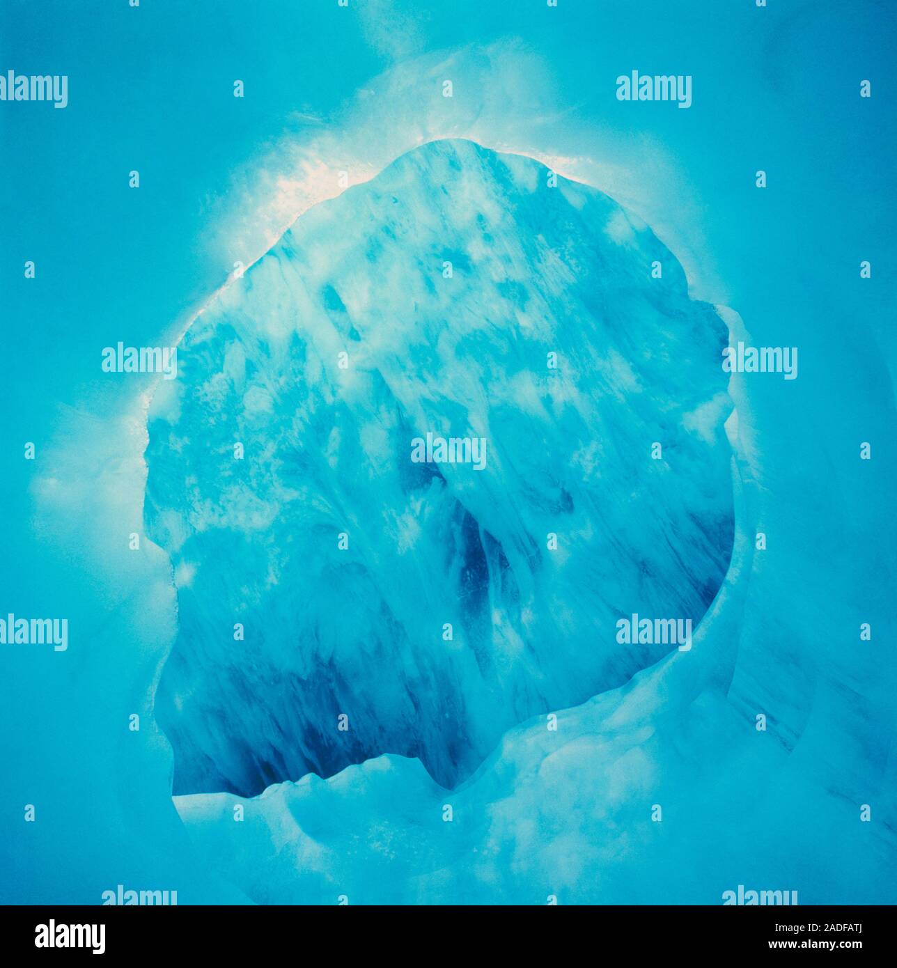 Deformed ice. Deformed layer of glacial ice (centre). Under high ...