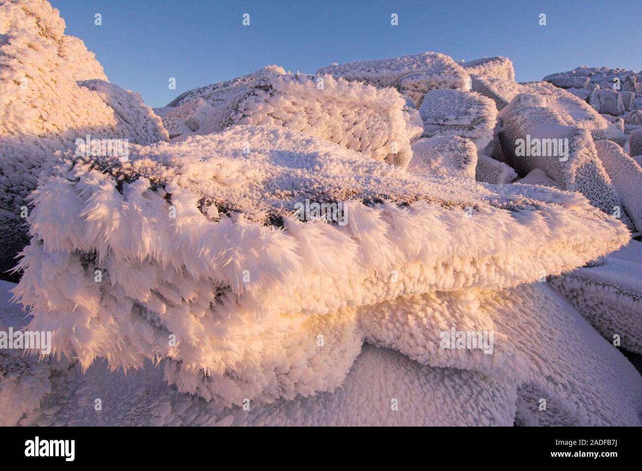Ice feathers. These ice formations on granite boulders are also known ...