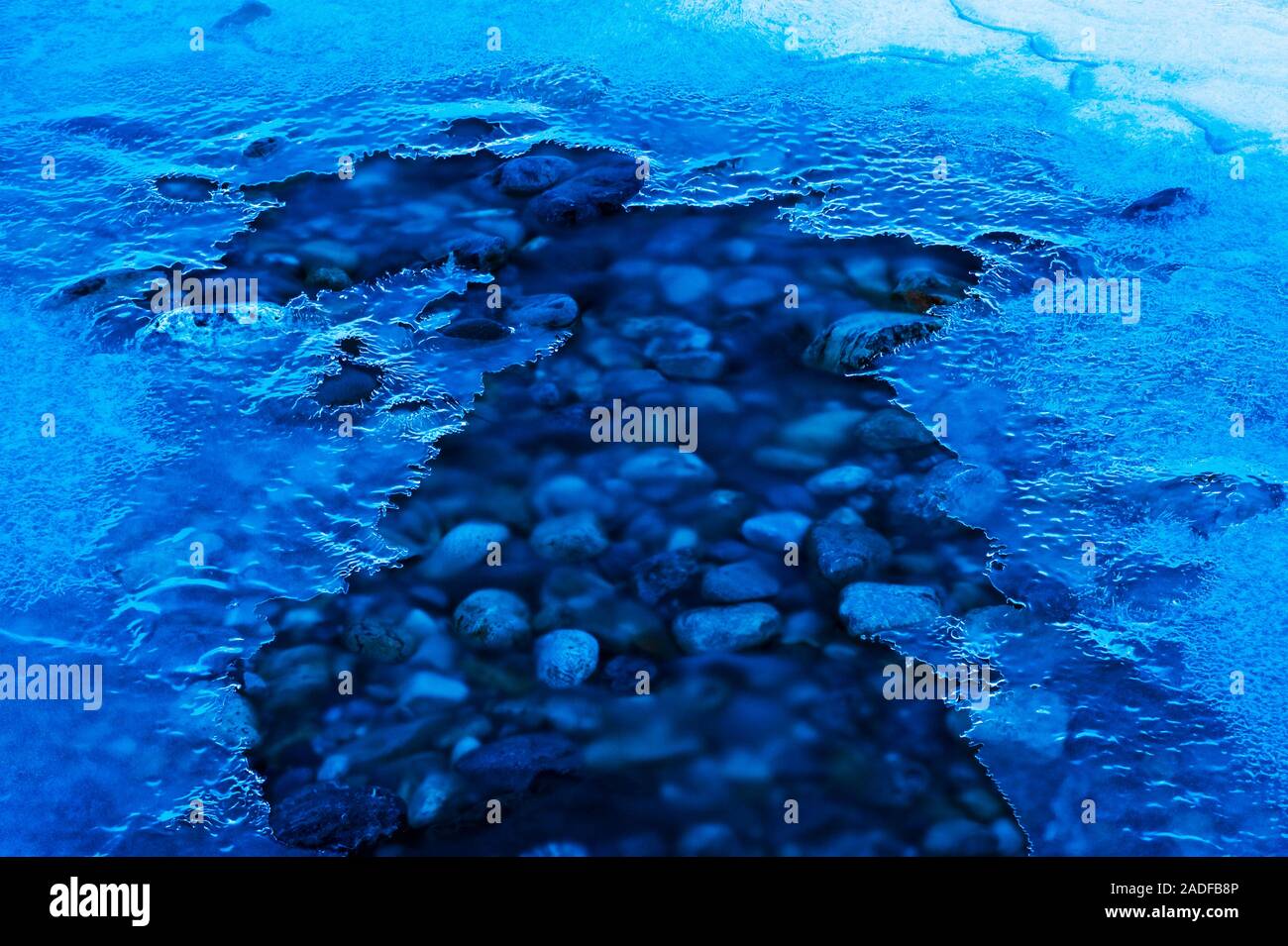 Freezing river. Ice forming on the surface of a river. Photographed in ...