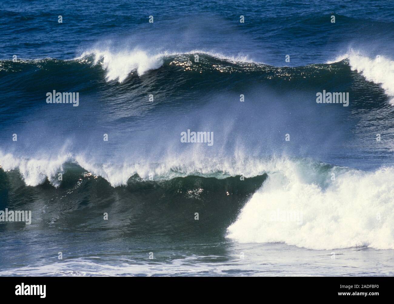 Waves. View of wind-blown waves (combers) of the Pacific Ocean breaking ...