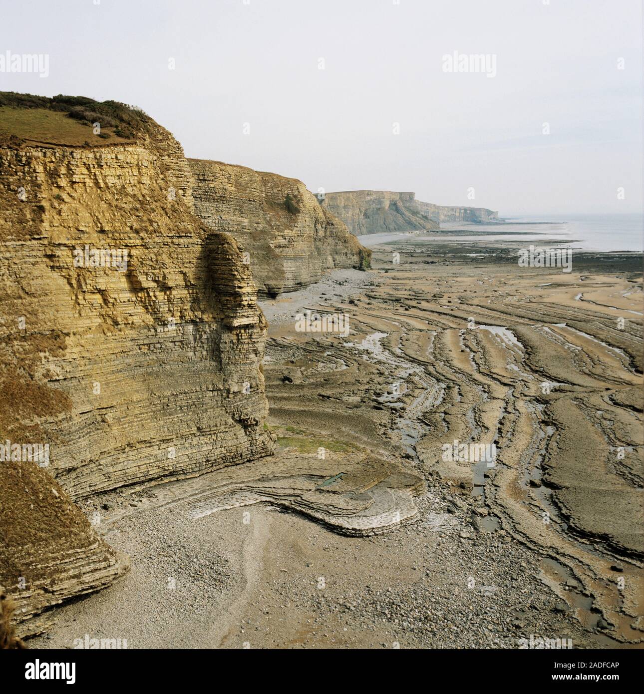 Coastal erosion. Aerial photograph of eroded headlands. The rock in ...
