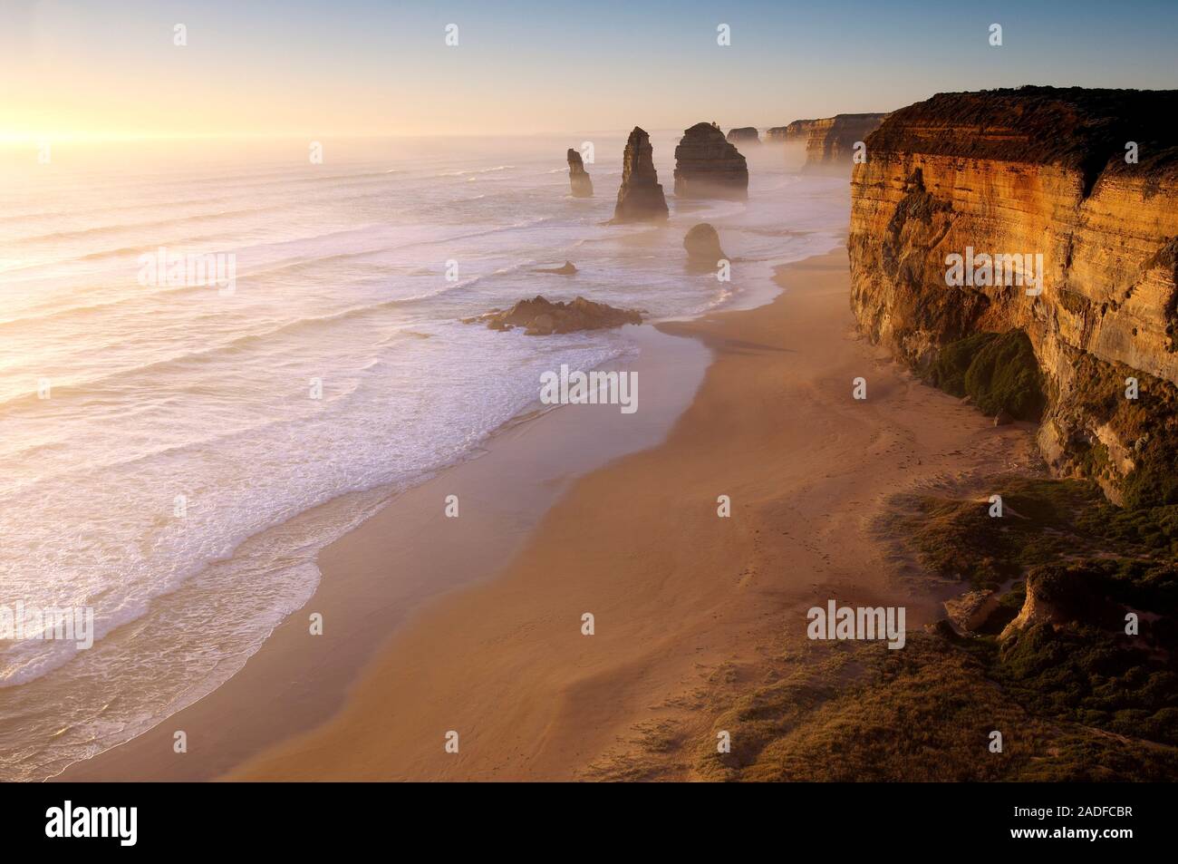 Eroded coastline. The limestone sea stack formations (upper right) are ...
