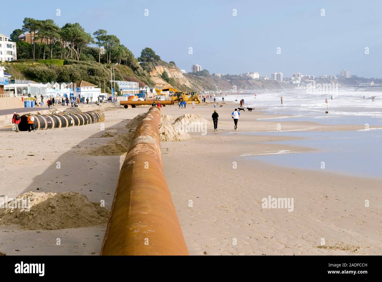 Beach replenishment. Construction of the 'sinkerline' long pipe at ...