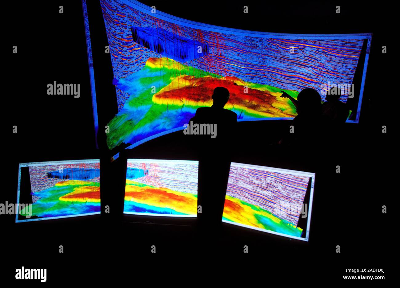 Geologist studying GeoProbe model. GeoProbe is a software system that ...
