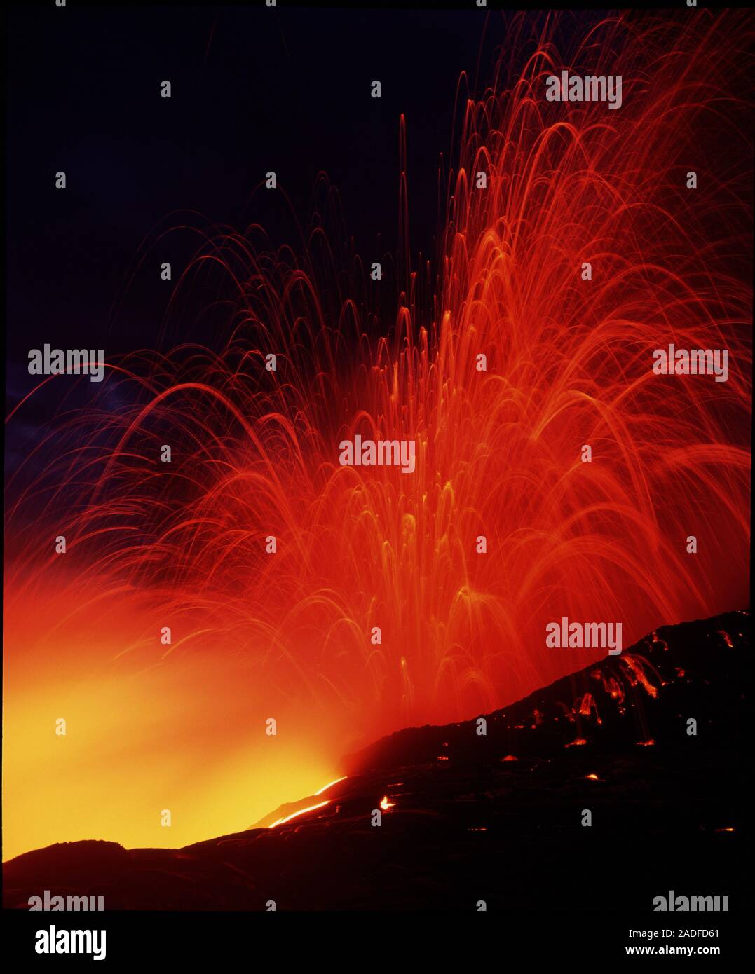 Lava flow. Explosion caused as a flow of molten rock (lava) enters the ...