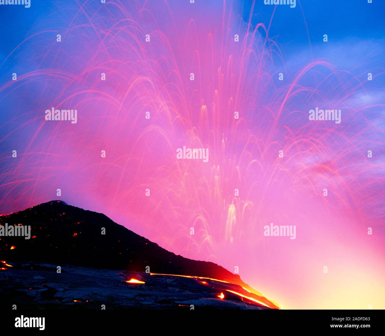 Lava flow. Explosion caused as a flow of molten rock (lava) enters the ...