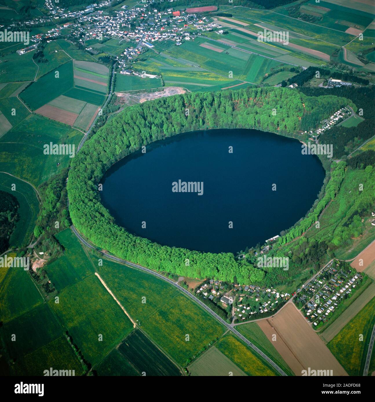 Crater lake. View of the Pulvermaar crater lake. This ancient feature ...