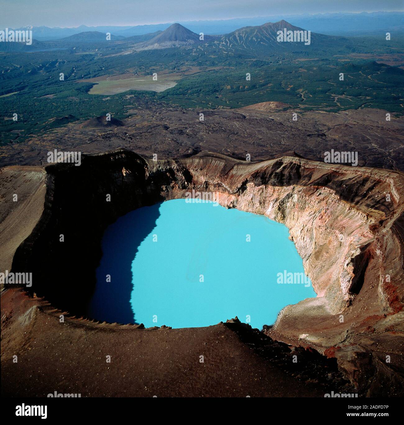 Crater lake. Aerial view of the crater lake in the caldera of Maly ...