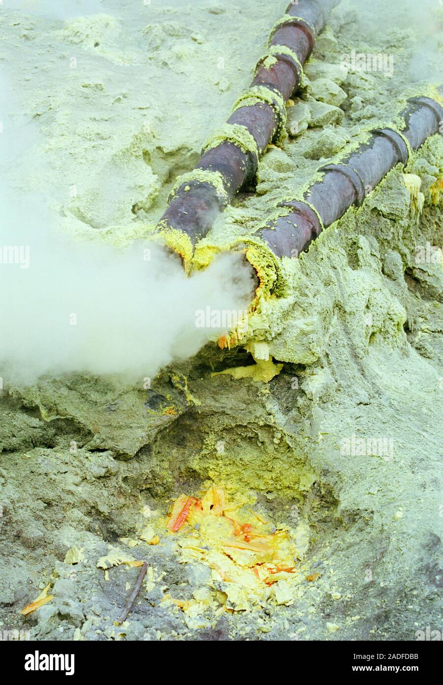 Volcanic sulphur mining. Cast iron pipes conducting sulphur-rich gases ...