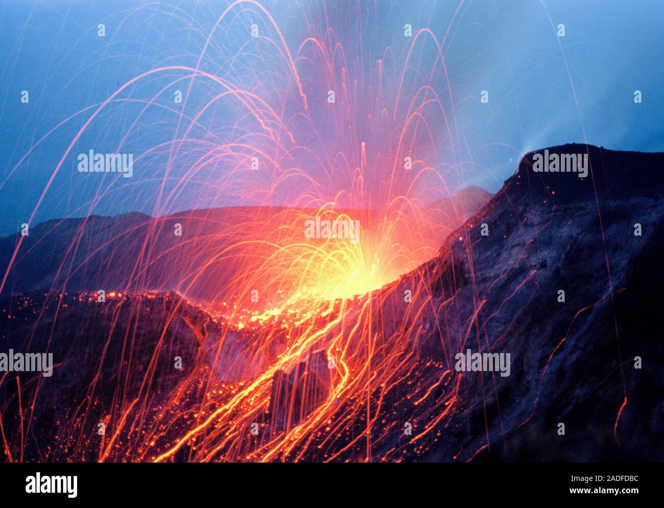 Batur volcano erupting. Glowing lava (molten rock) being thrown in the ...