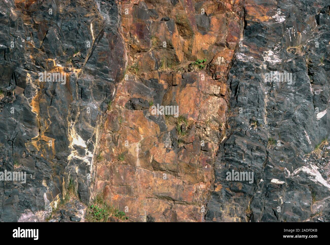 Tertiary volcanic intrusion called a dyke. A dyke is a sheet of rock ...