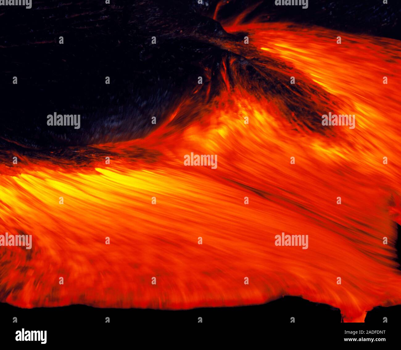 Pahoehoe lava. Time exposure image of a pahoehoe lava flow from Kilauea ...