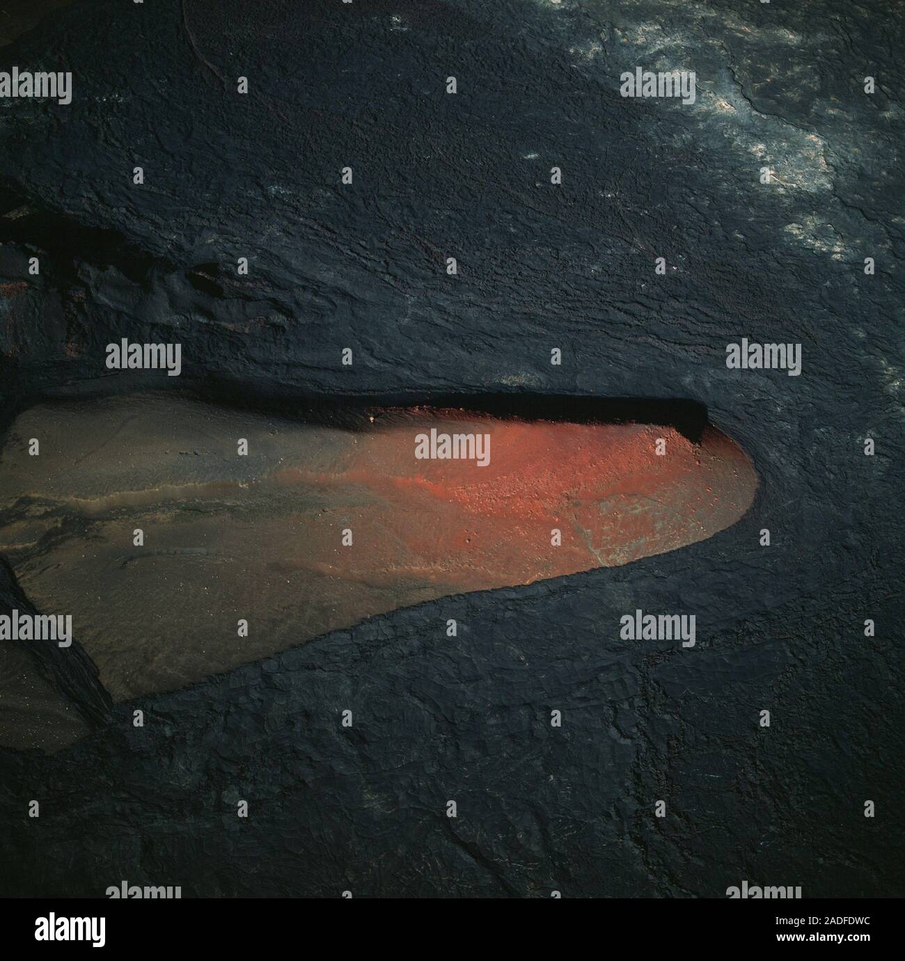 Lava flow. Aerial photograph of a recent solidified lava flow (black ...