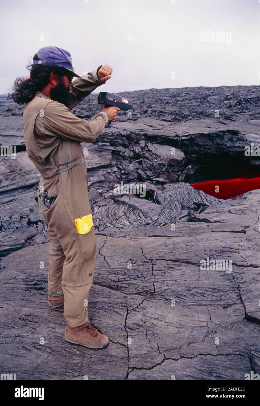 MODEL RELEASED. Kilauea volcano research. Vulcanologist recording lava ...