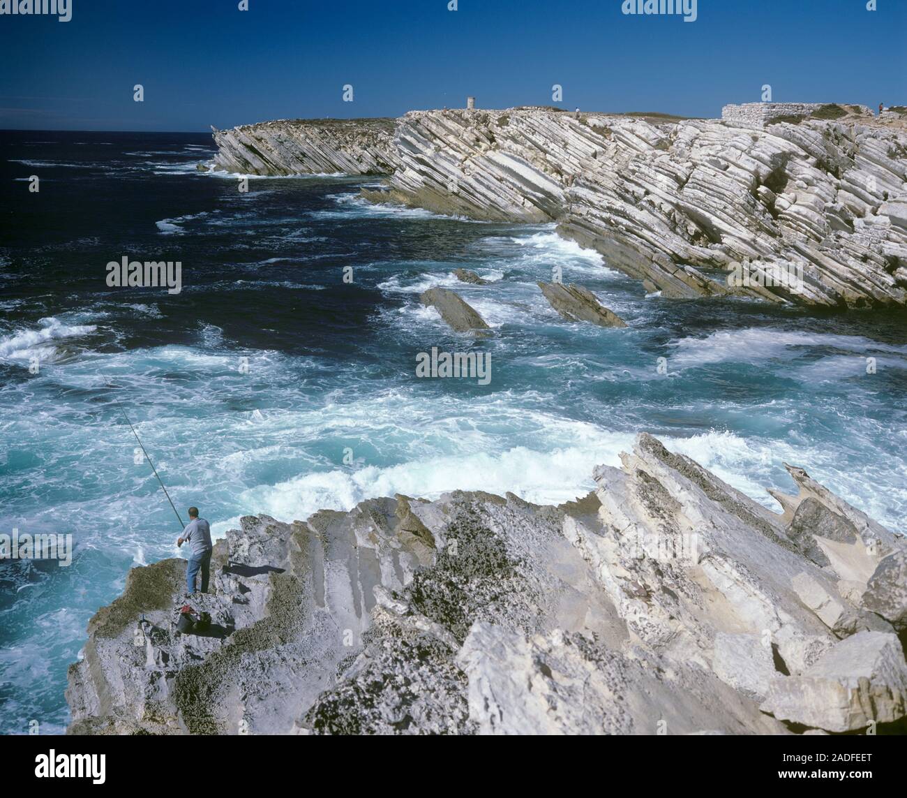 Rock strata revealed in eroded coastal rocks. The diagonal strata seen ...