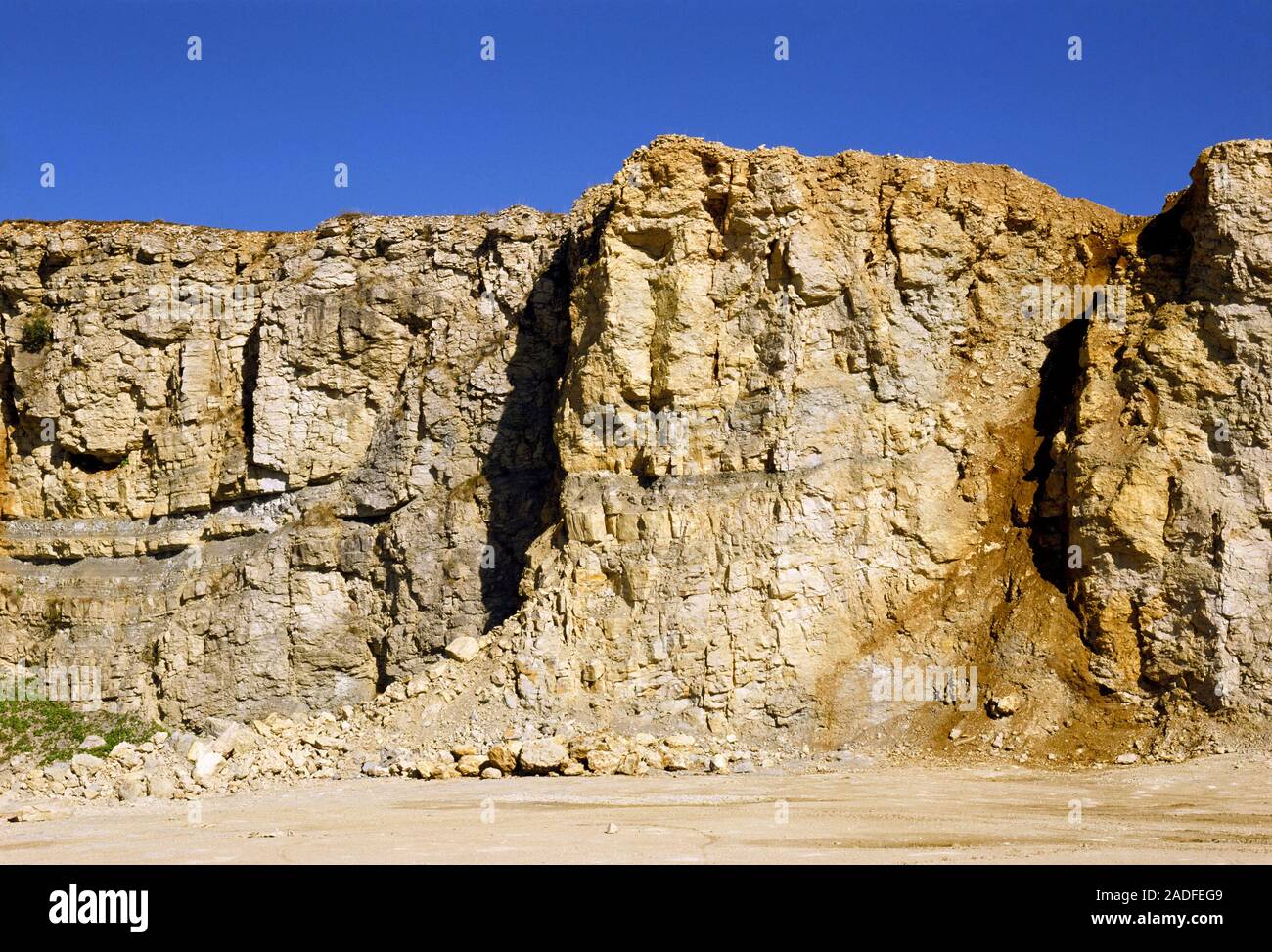Strata in a limestone rock face, a sedimentary rock of calcium ...