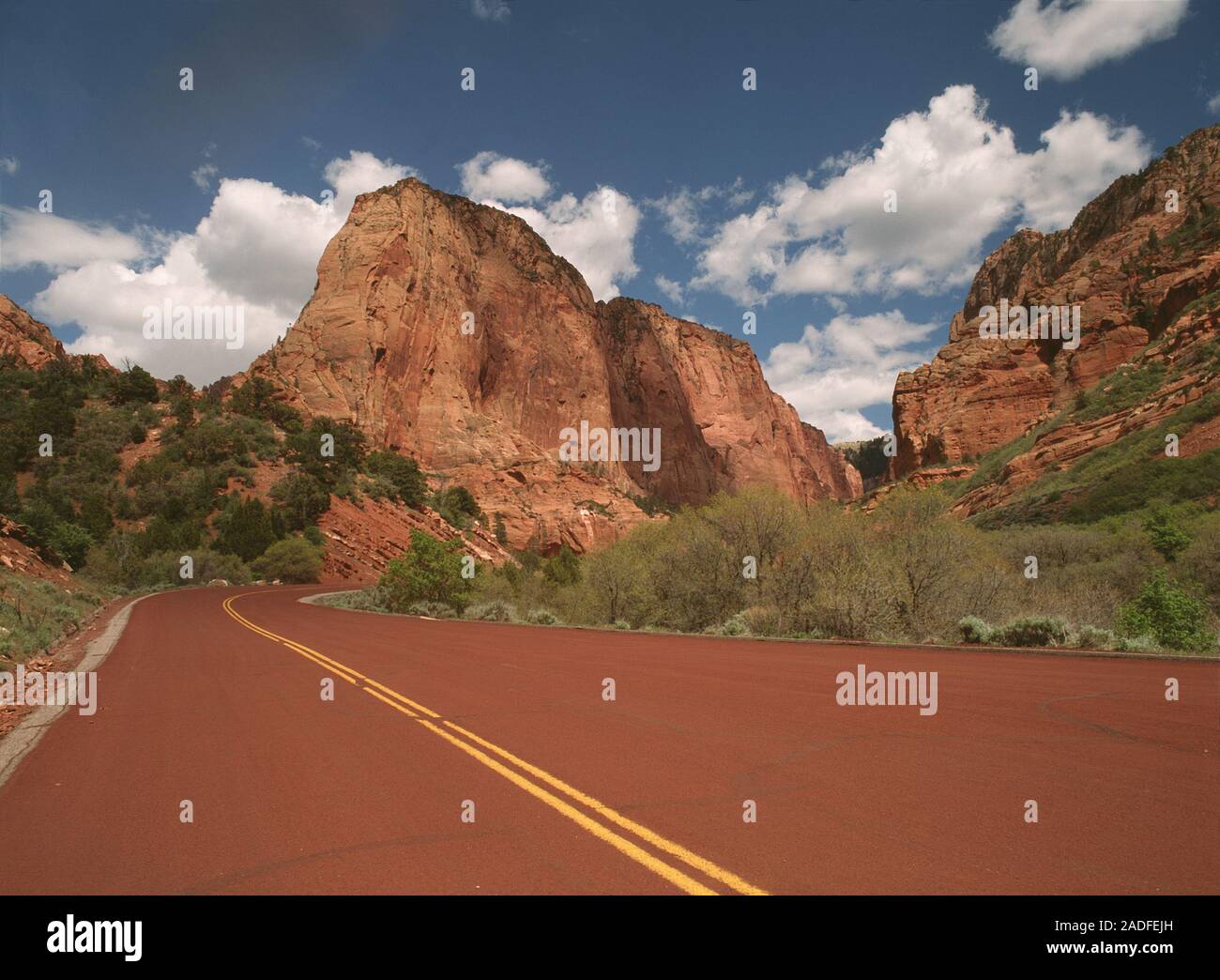Sedimentary rock formations. View of a road running between sedimentary ...