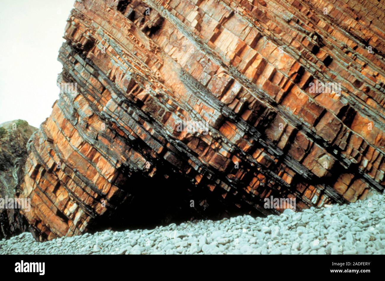 Regular dipping beds. Stratified layers (strata) of rocks lying at an ...