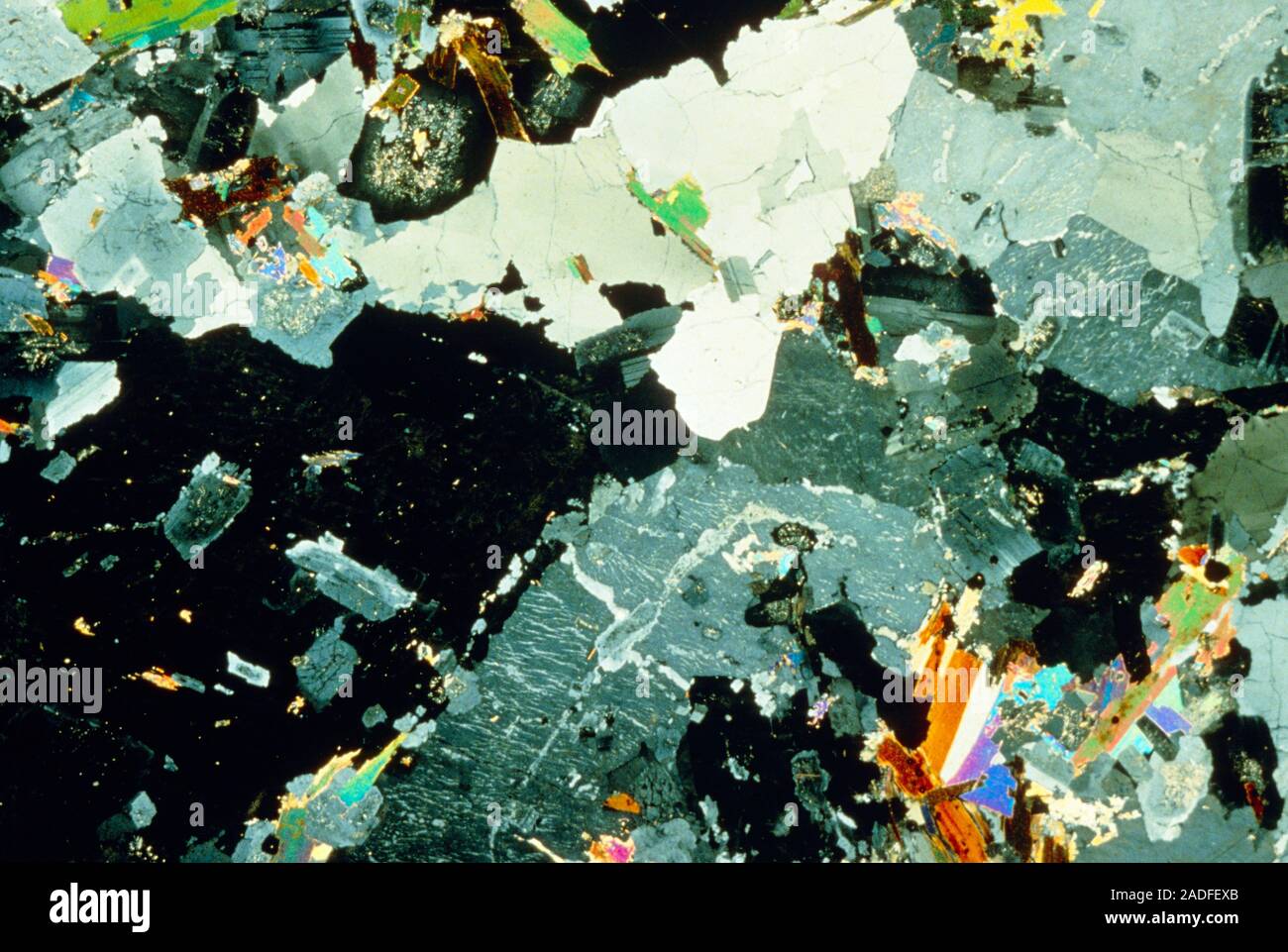Cross polarised light micrograph of a thin section of Cornish granite ...