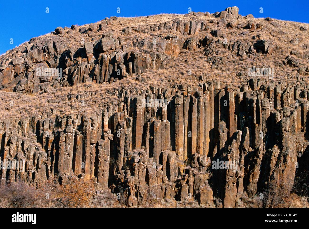 Columnar basalt rock. Basalt is a fine-grained, extrusive igneous rock ...