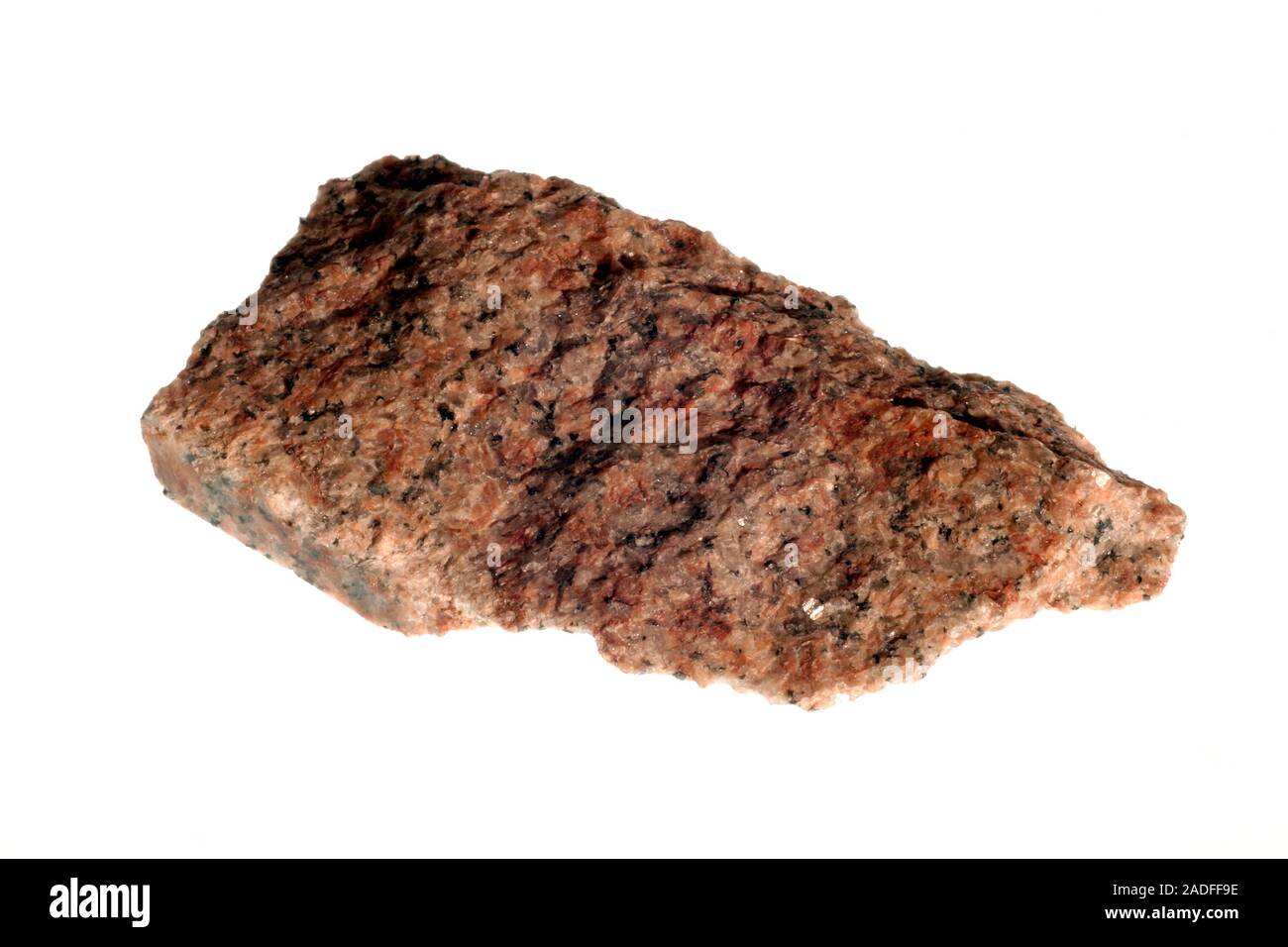 Red granite sample. Granite is an intrusive igneous rock consisting of ...
