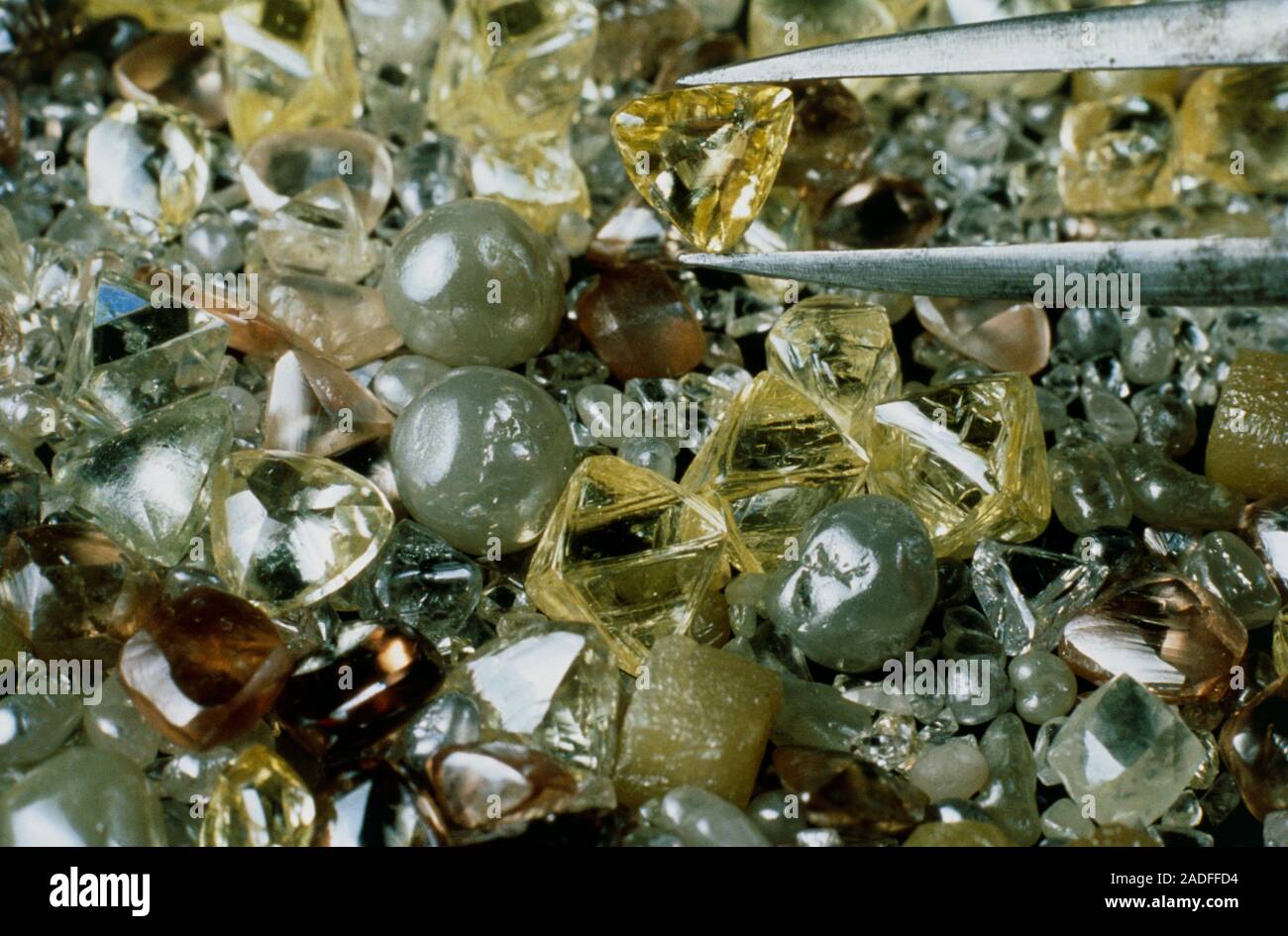 A mixture of natural and synthetic industrial diamonds. Diamond is a ...