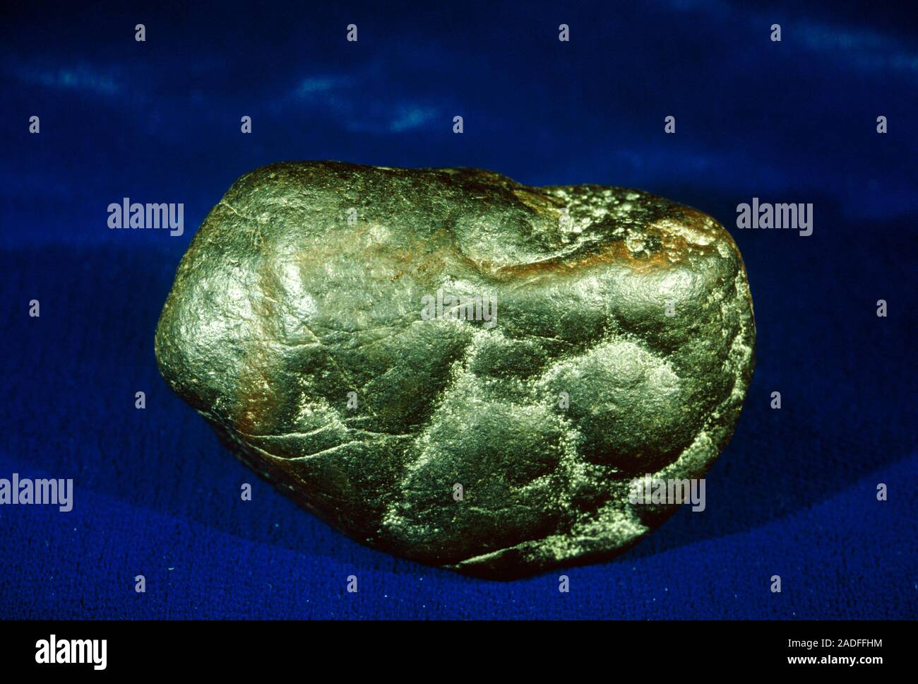 Sample of cassiterite. Cassiterite, a form of tin oxide, occur either ...