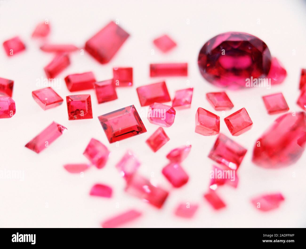 Precious gemstones of ruby (red) and garnet (pink). Gemstones are solid ...