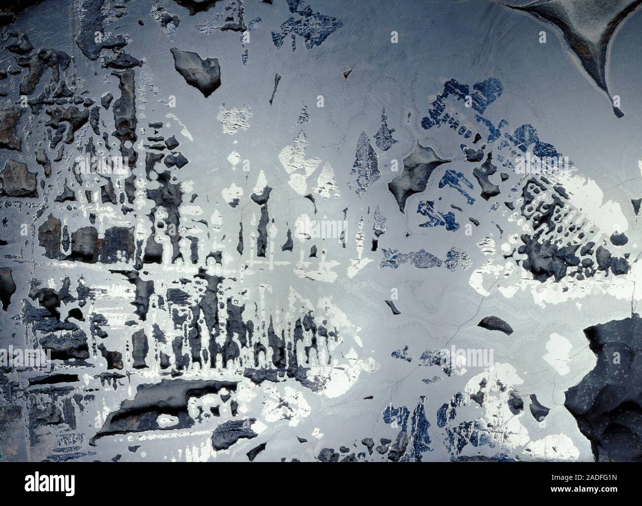 Lead ore surface. Patterns on a cut and polished surface of a piece of ...