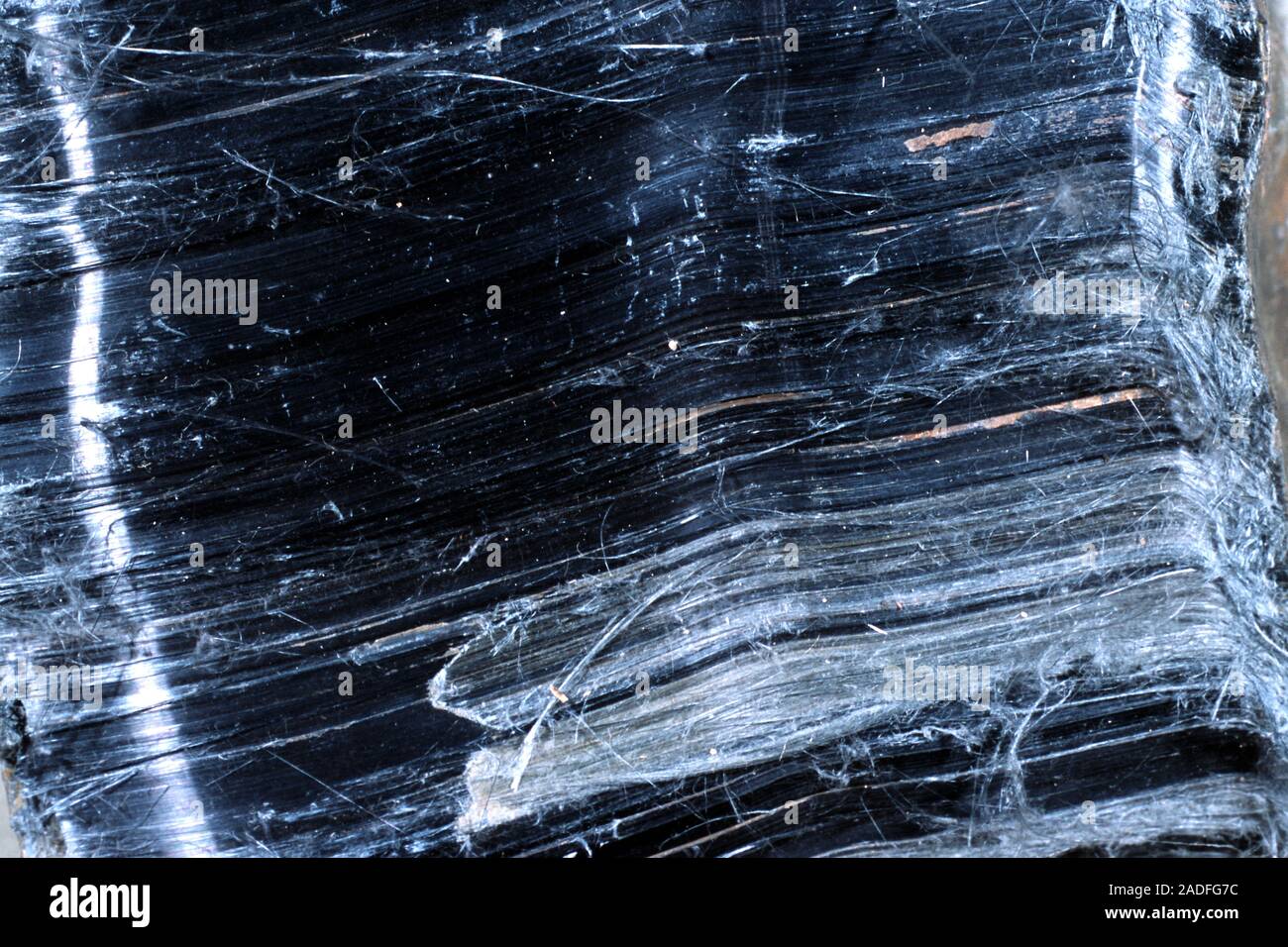 Crocidolite mineral. Crocidolite is a dark blue asbestiform (fibrous ...