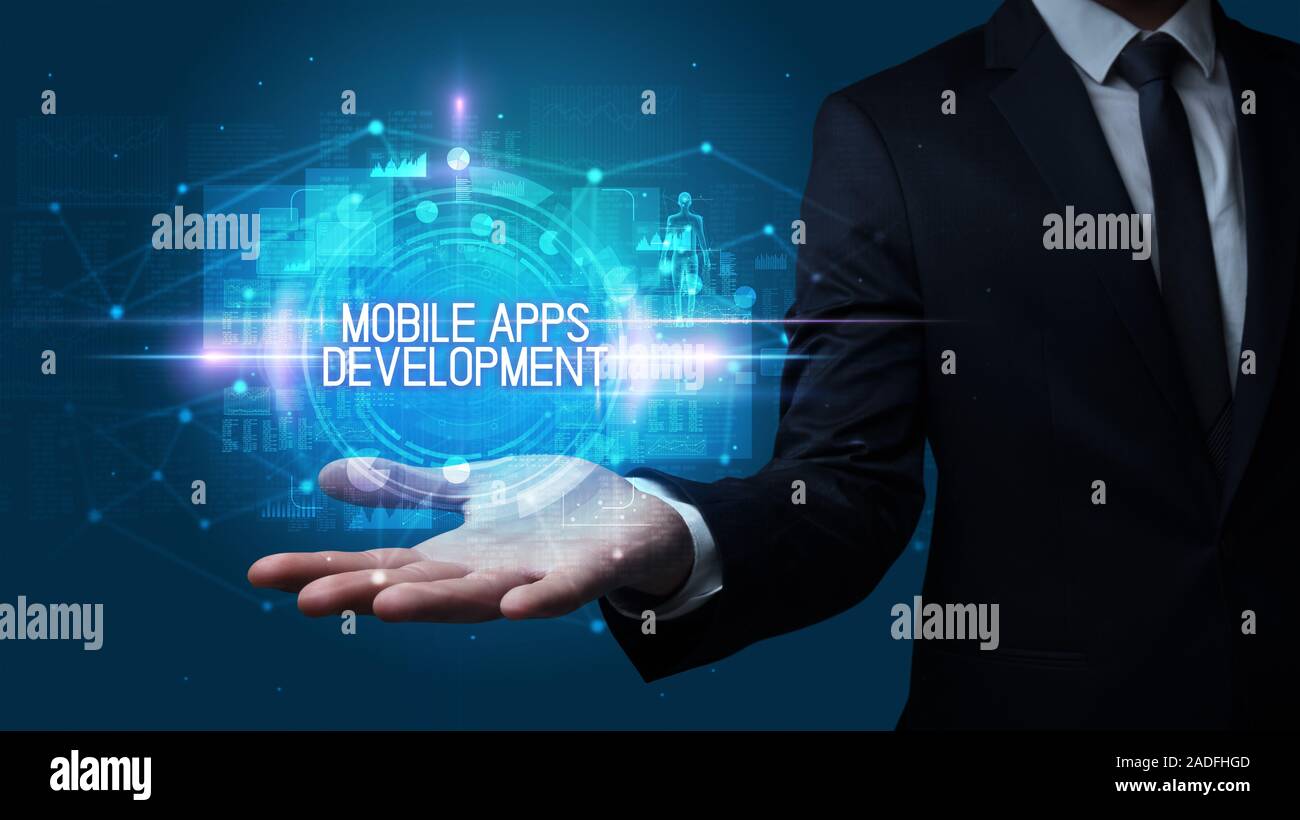 Man hand holding MOBILE APPS DEVELOPMENT inscription, technology ...