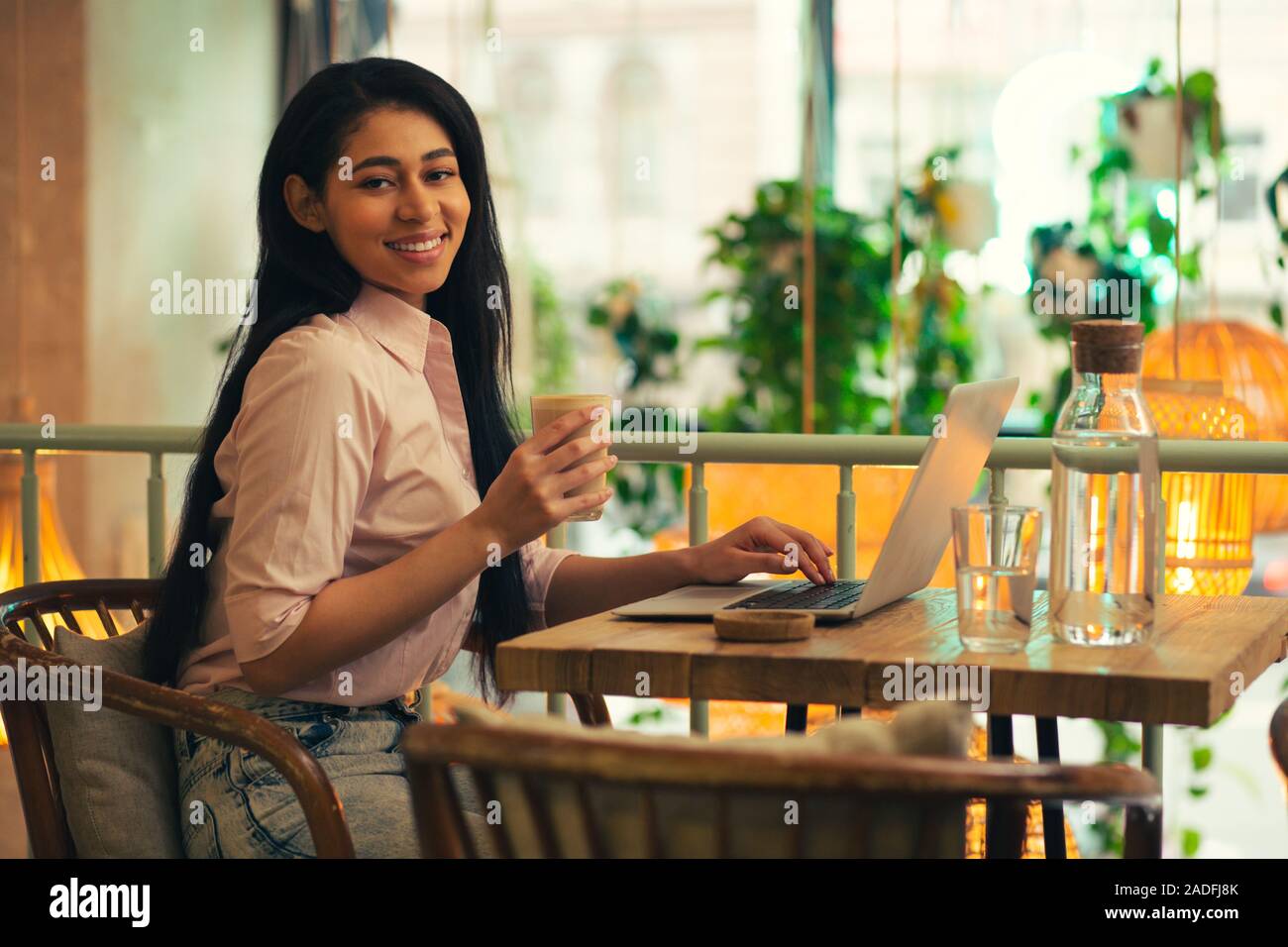 Pretty smiling lady posing hi-res stock photography and images - Alamy