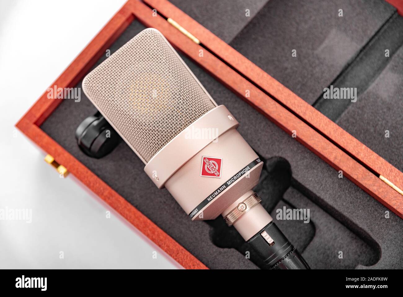 Large diaphragm condenser studio microphone Neumann tlm 103 on a white ...