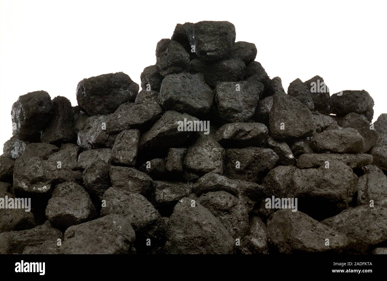 Pile of coal. Coal is a type of fossil fuel. When it is burned it ...