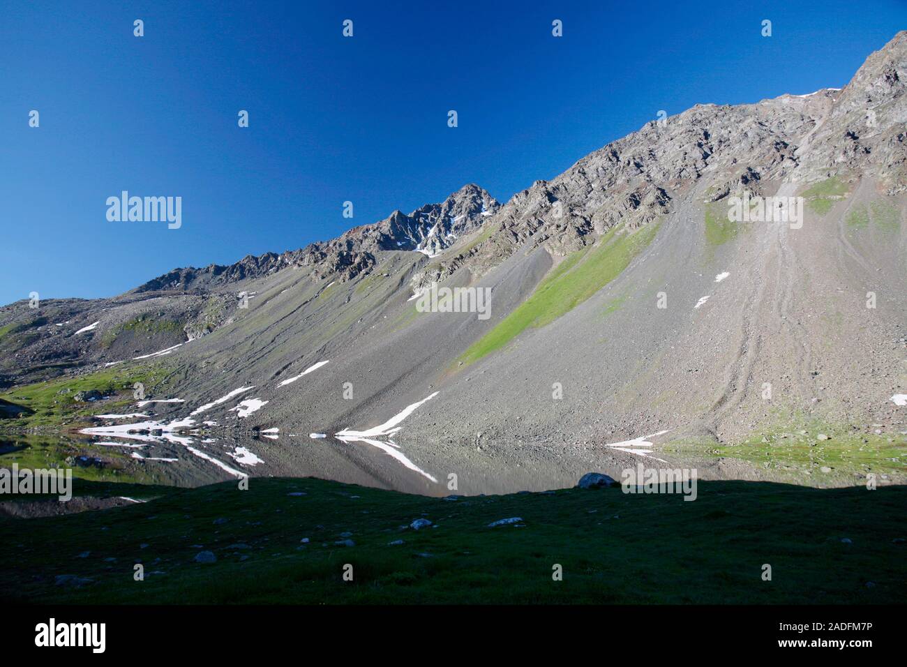 Scree slopes. Weathered rock material on slopes in an alpine valley ...