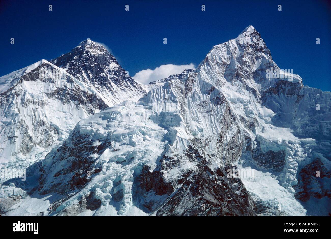 Everest and Nuptse. The west face of Nuptse is a huge and complex face ...