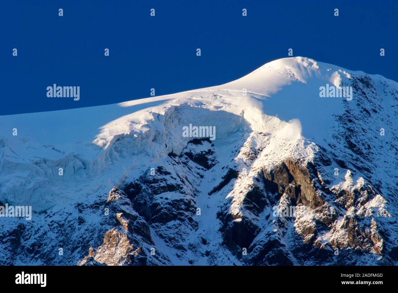 Mount Collon, Switzerland. Peak of Mount Collon at an elevation of 3637 ...