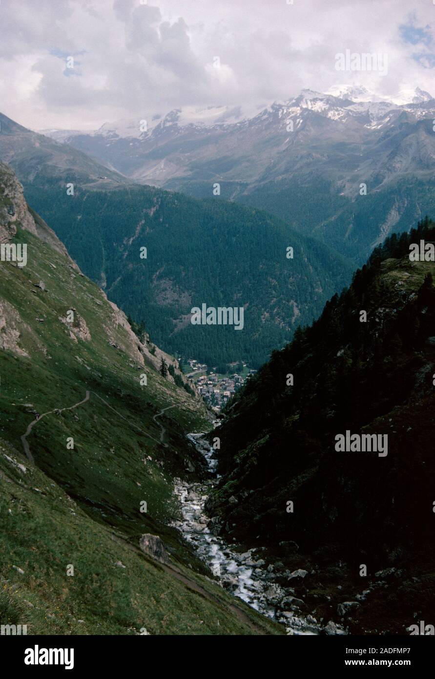 Alpine valley. V-shaped valley in the Swiss Alps. Switzerland Stock ...