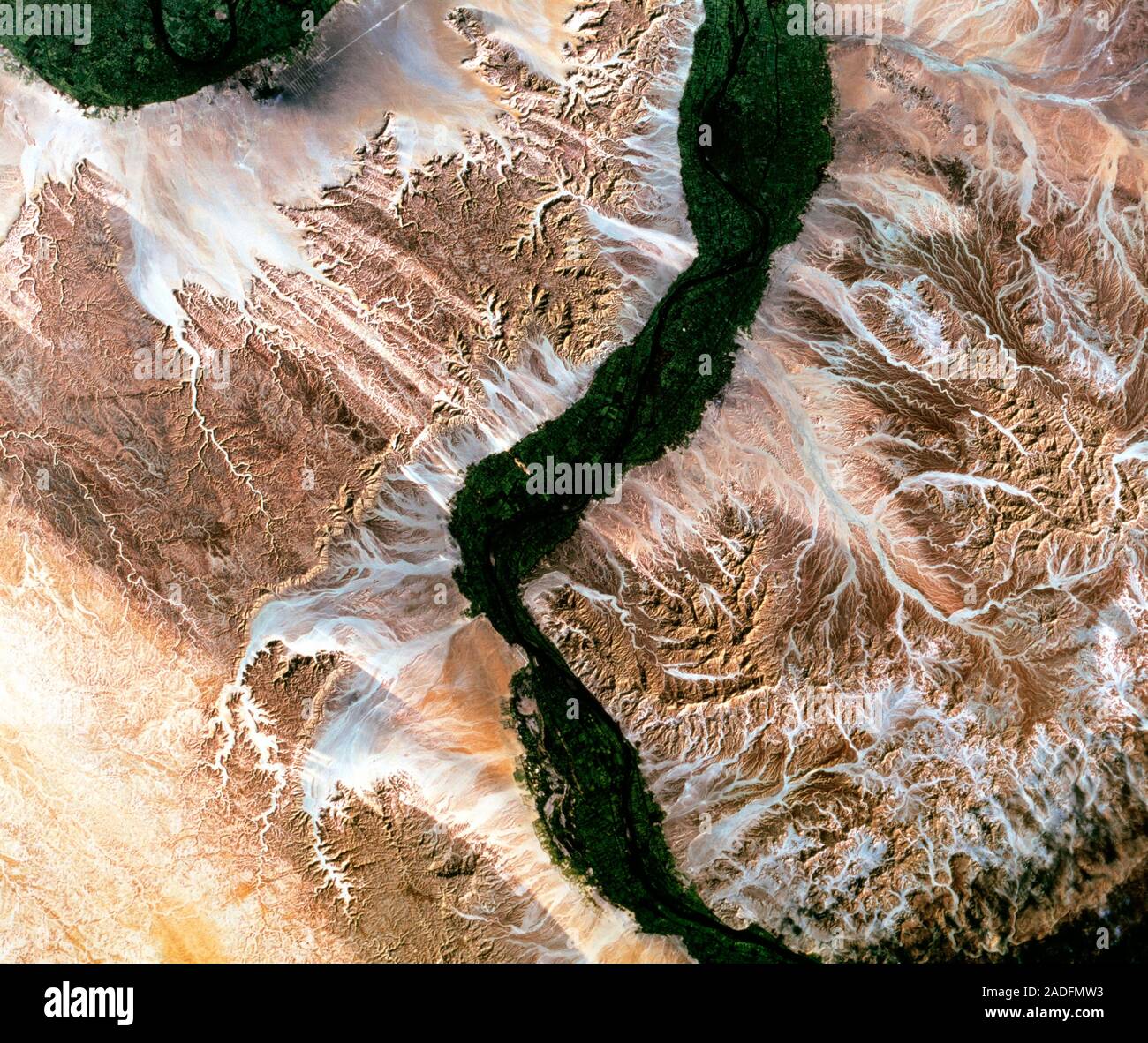 River Nile, Luxor, Egypt, satellite image. North is at top. Water is ...