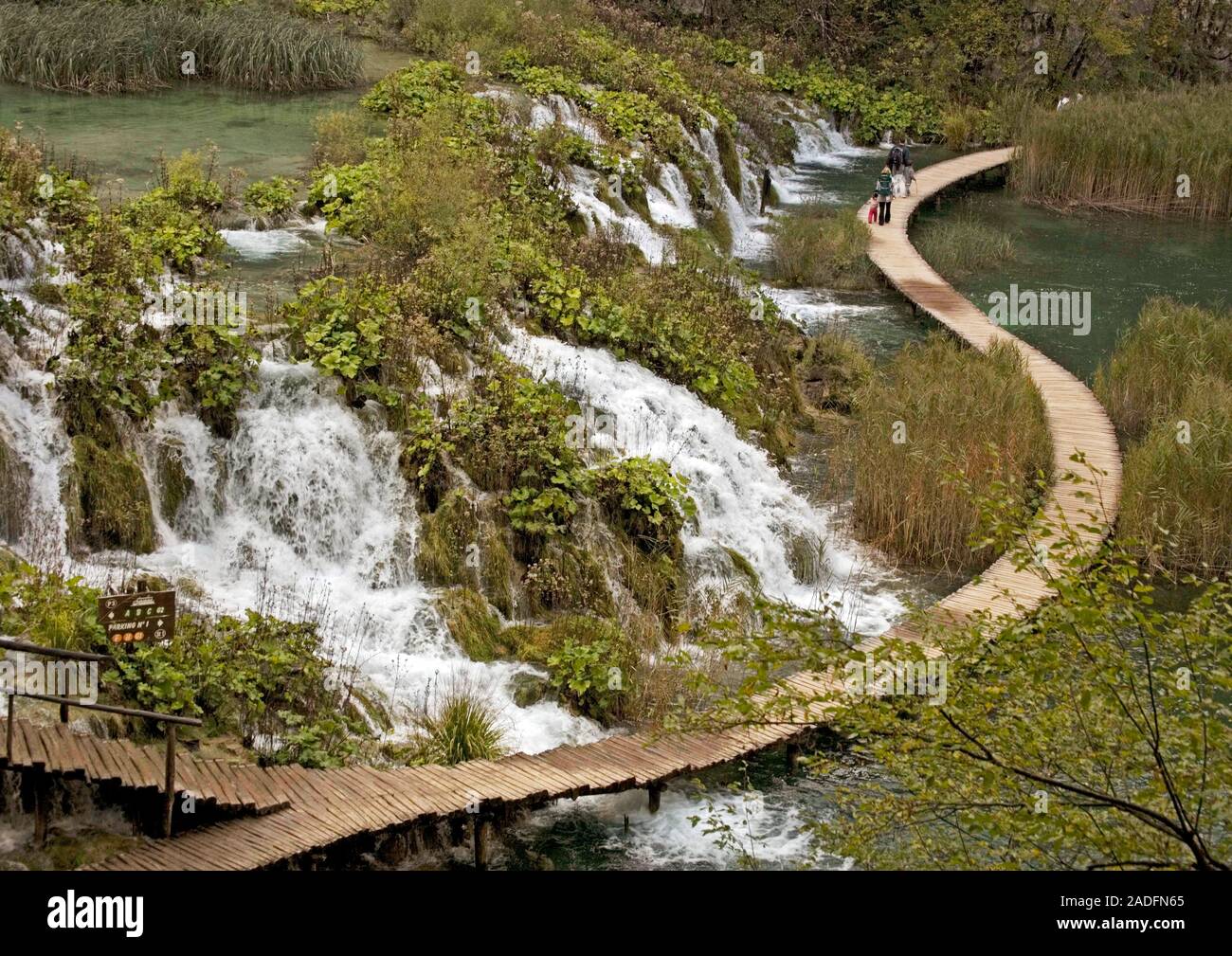 Travertine dam. River flowing over a travertine dam at Plitvice ...