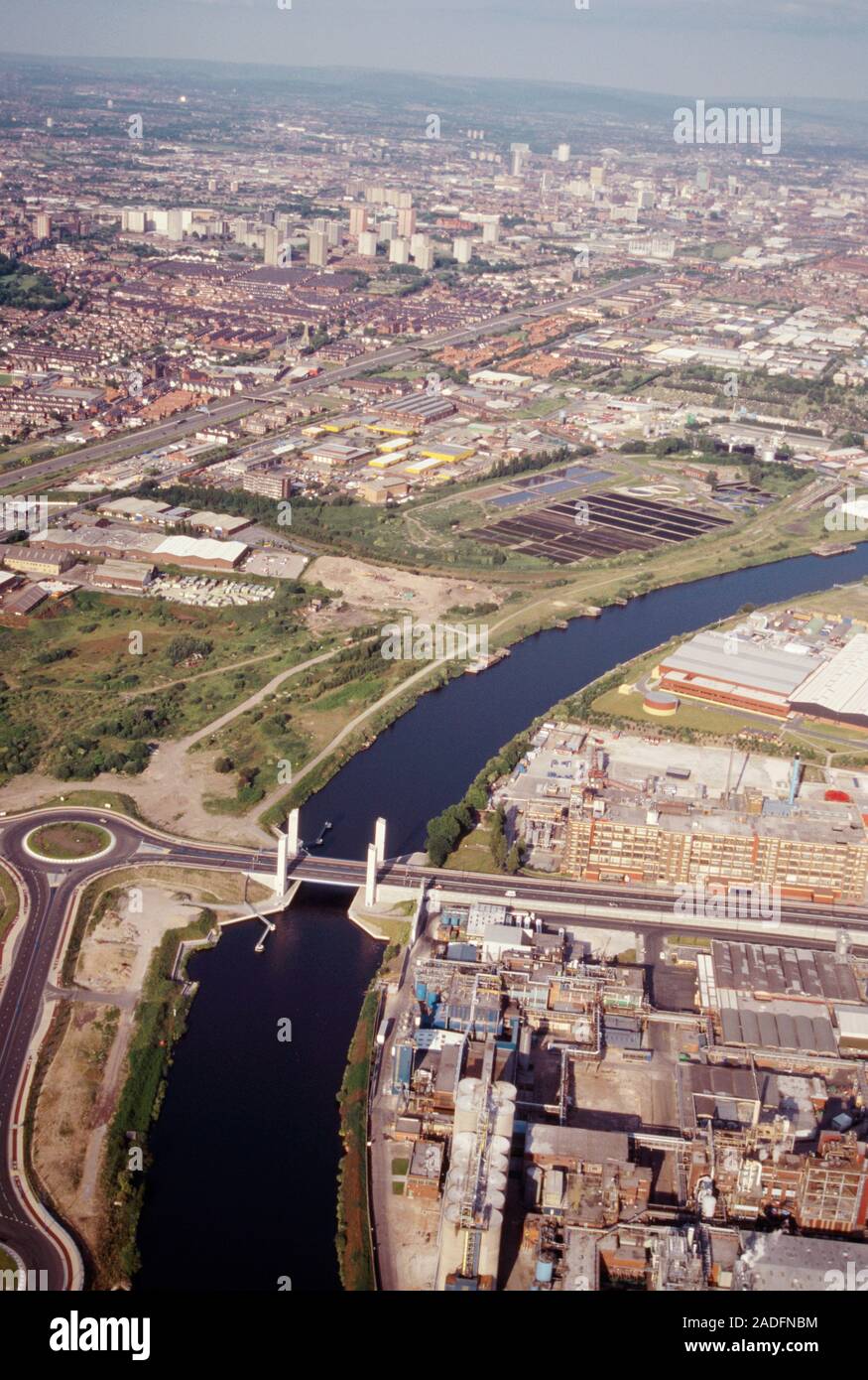 Manchester ship canal, aerial view, crossed by a bridge in the ...