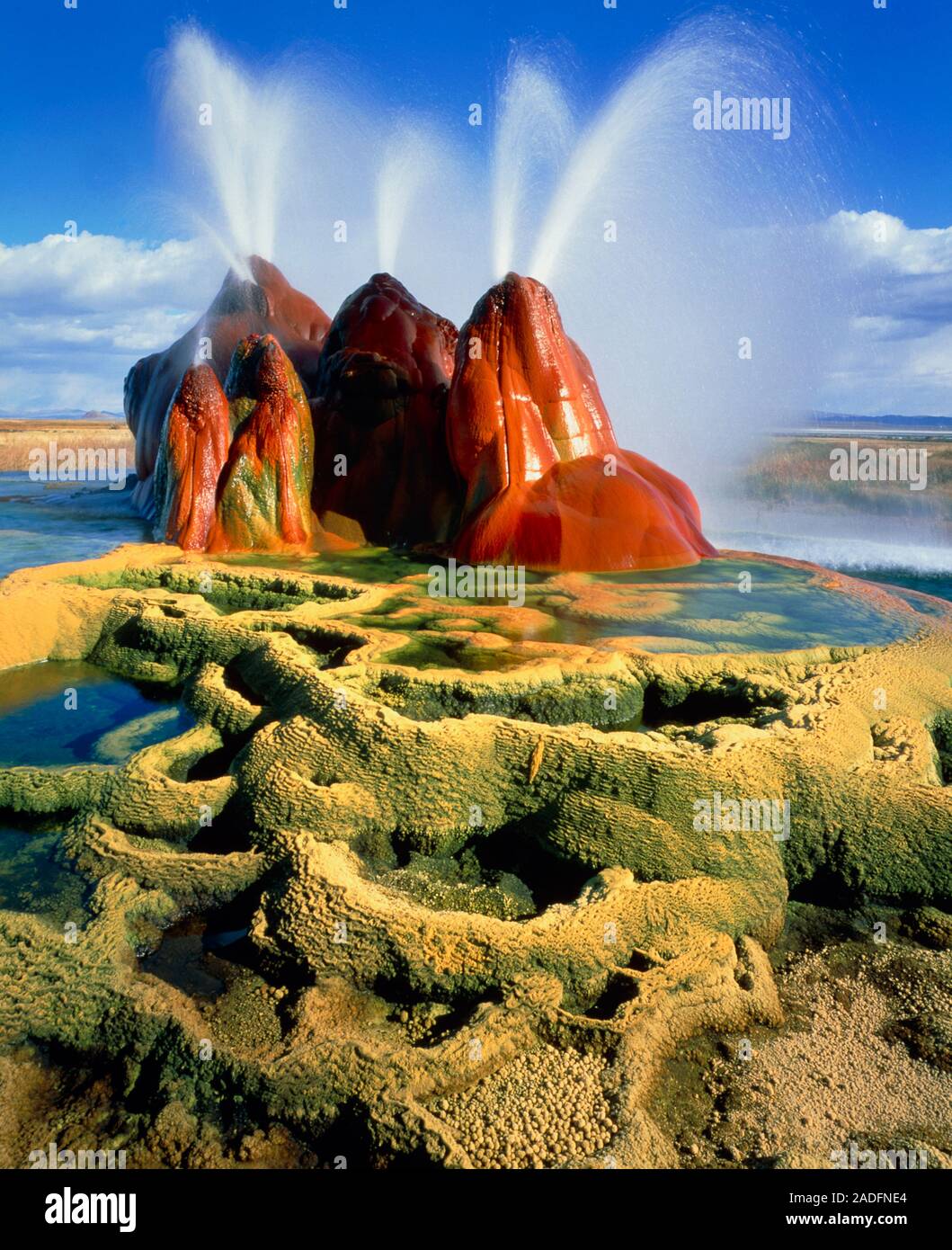 Fly Geyser. View of the continually erupting Fly Geyser in the Black ...