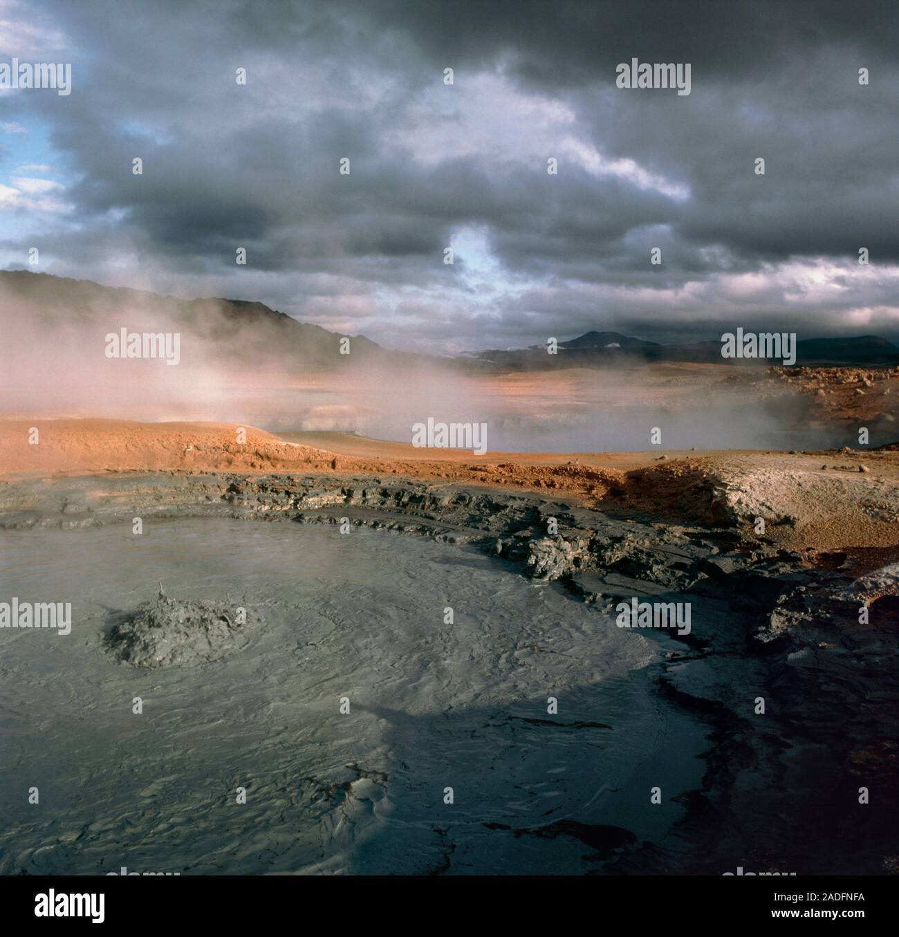 Mud pool. Boiling mud pool in Namafjall, an area of volcanic activity ...