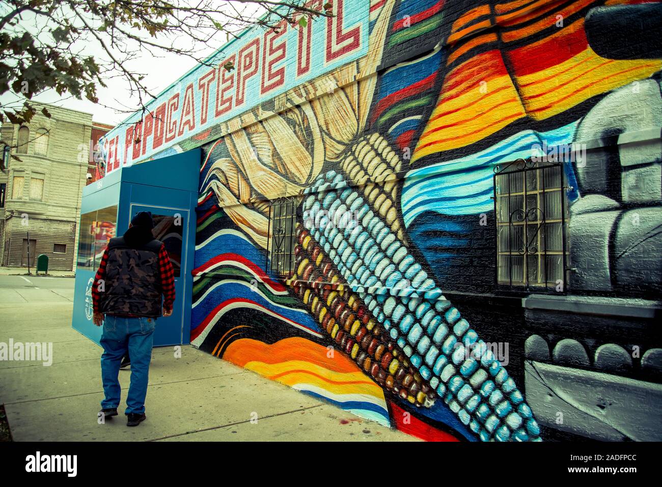Colourful mural with a Latino theme in Pilsen neighborhood that is ...