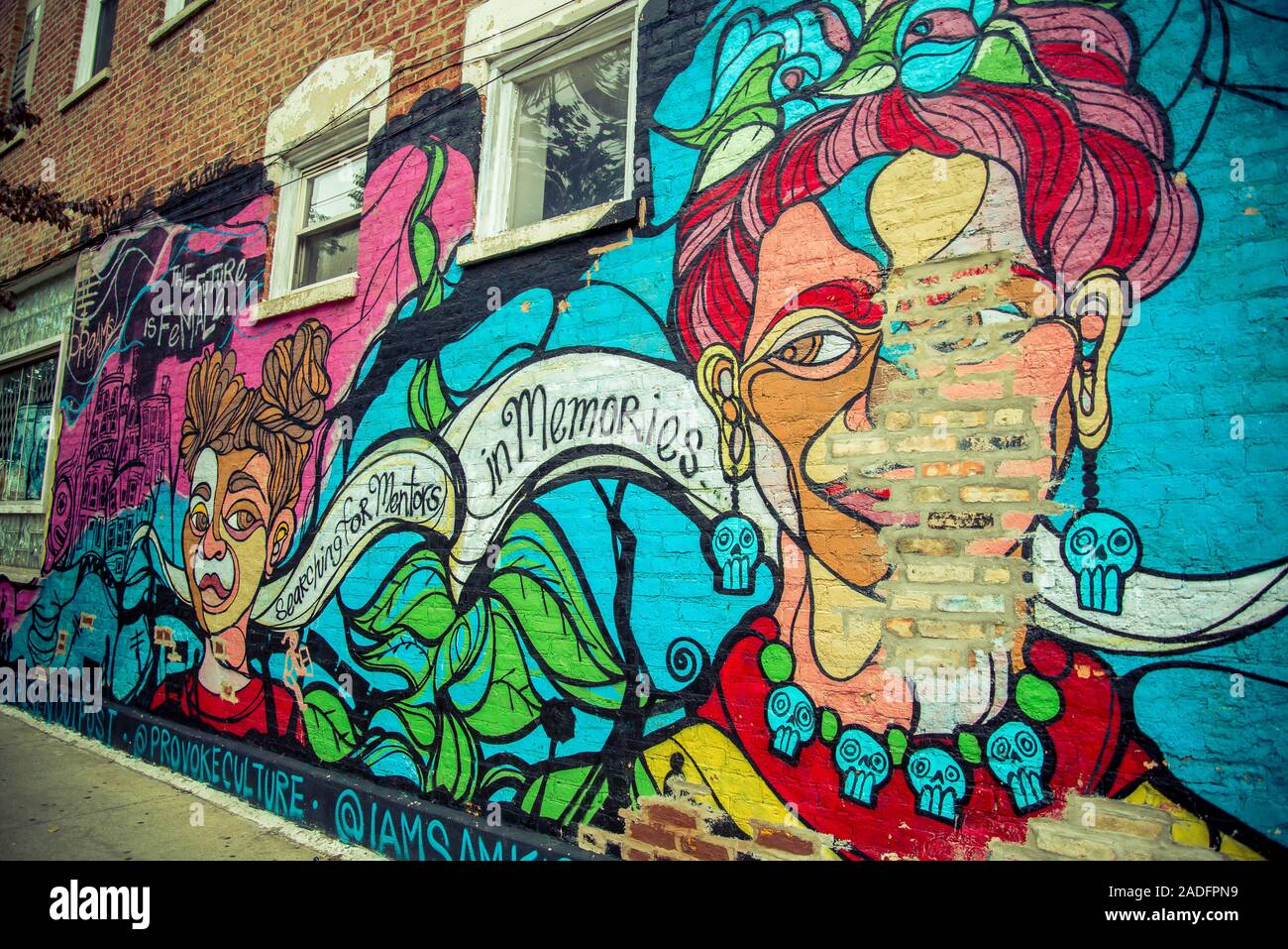 Colourful mural with a Latino theme in Pilsen neighborhood that is ...
