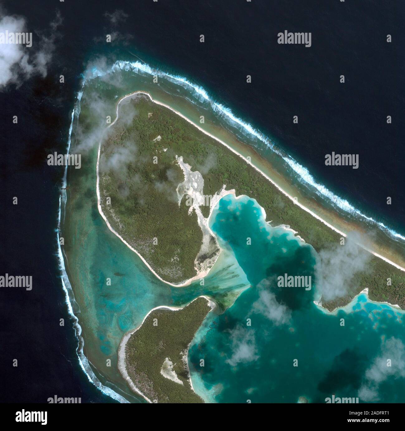 Coral atoll and lagoon. Satellite image of part of the Pacific atoll ...